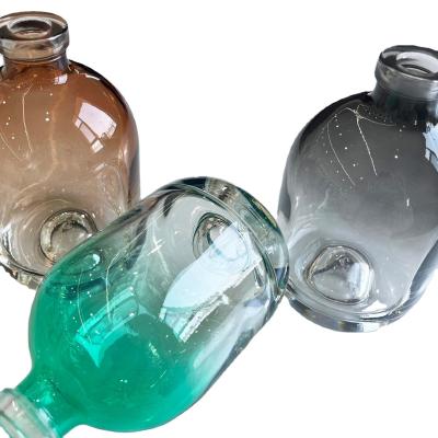 Cina 250 ml 375 ml 500 ml Bottiglia di whisky in vetro con fondo spessa con disegno rotondo trasparente personalizzato in vendita