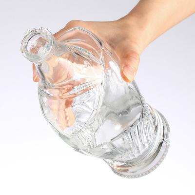 Cina Disegno su misura Forma rotonda Bottiglia di whisky in vetro da 750 ml con sughero e chiaro in vendita
