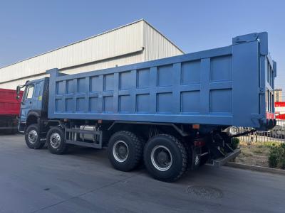 중국 380hp Sinotruk Howo 8x4 덤프 트럭 12 바퀴 HW76 ZZ3317V3567B1R RHD 우아한 파란색 판매용