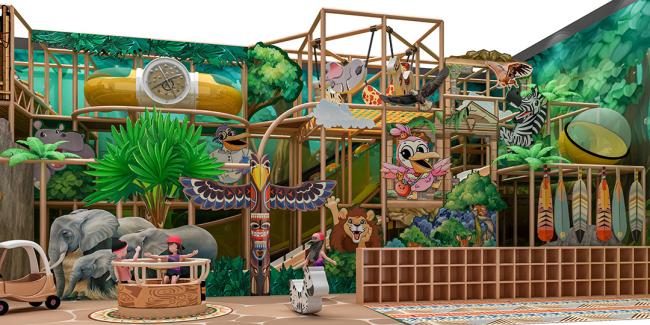 Forest theme indoor play structure showing colorful jungle elements