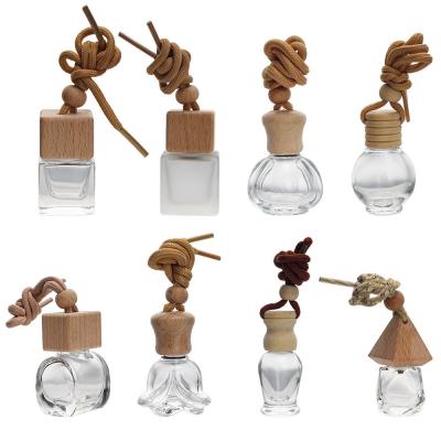 China 8ml 10ml Glass Car Air Freshener Bottle with Wooden Lid for sale