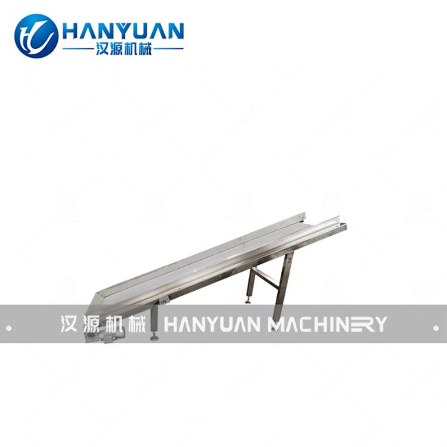 Conveyor system for cereal bar processing line