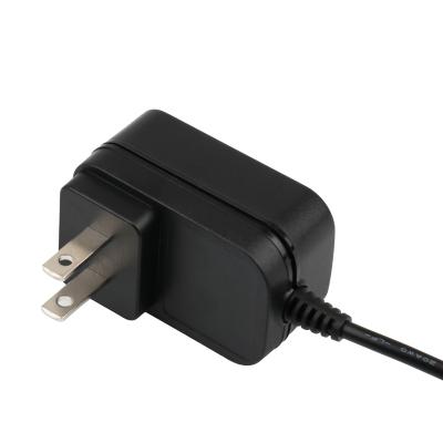Cina 1310 efficienza di commutazione certificata UL VI dell'alimentazione elettrica di CA di 0.65A 9.0V con la spina degli Stati Uniti in vendita