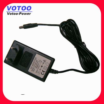China Adaptador europeo de la transferencia del cuaderno del soporte de la pared del enchufe 24V 1A para el enchufe BRITÁNICO en venta
