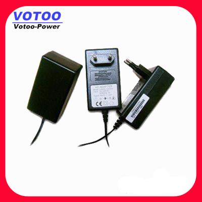 China Adaptador de la transferencia de la fuente de alimentación de la posición 12V 2A con el enchufe positivo interno de DC en venta