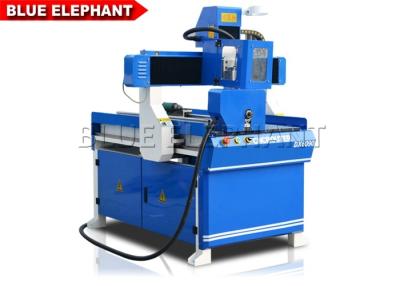Cina fuso di raffreddamento ad acqua di 1,5 chilowatt (marca superiore in Cina), macchina di legno di pubblicità del router di CNC di ELE 6090 per alluminio in vendita