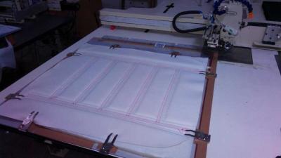 Cina Le macchine da cucire industriali automatiche di CNC 2.5mm cucono la lunghezza per abbigliamento/pantaloni in vendita