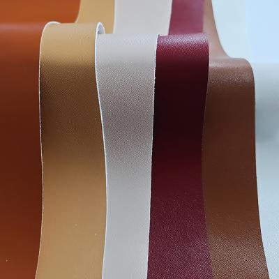 China Environmentally Friendly Coated Microfiber Fabric 0.7mm 50 Yards Clothing Leather Fabric for sale