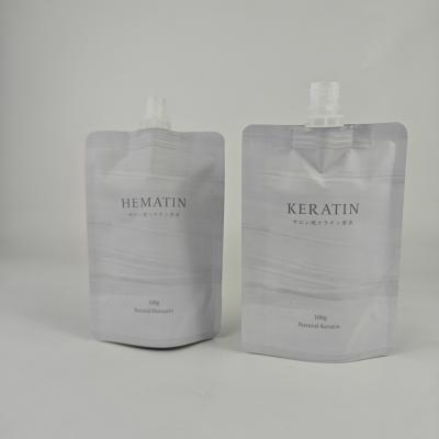 Cina Customized Wholesale 100g Heat Seal Skin Care Cosmetic Plastic Packaging Bag Spout Pouch with Round Corner in vendita
