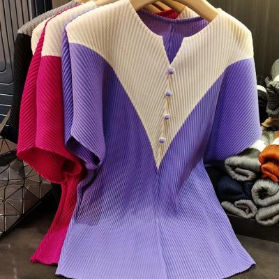 China Women's Elegant Summer New Dragon Scale Pleated V-Neck Top Niche Design Sense All-Match Color Matching Loose Casual Knitted for sale