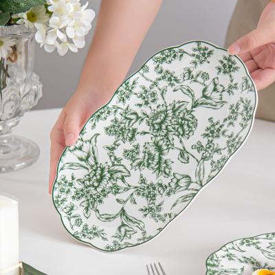 Chine Restaurant d'occasion Luxueux ensemble de dîner en céramique verte avec design de fleurs à vendre