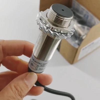 Cina Il sensore fotoelettrico attraverso il tipo G18 DC/SCR del fascio ha prodotto il commutatore fotoelettrico del metallo interurbano di rilevazione in vendita