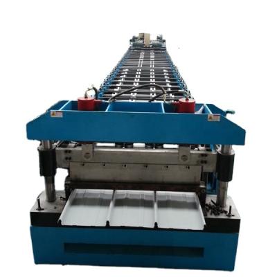 China Tipo de corte Máquina de moldagem de rolos de painéis de telhado PLC hidráulico 15m/min 15 rodadas à venda
