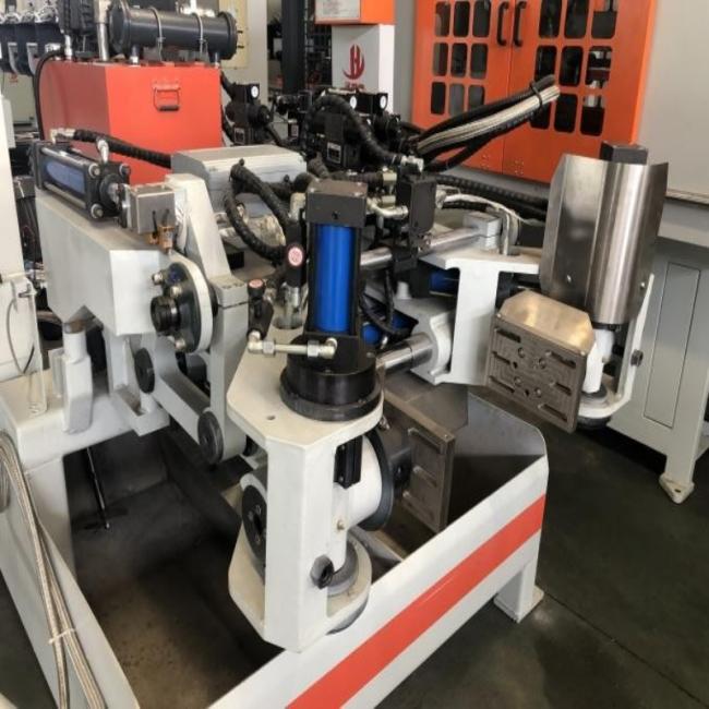 Side view of gravity die casting equipment