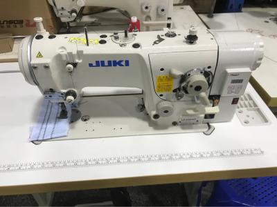 中国 JUKIのジグザグ形250Wの中古のミシンの高速0.25CBM容積 販売のため