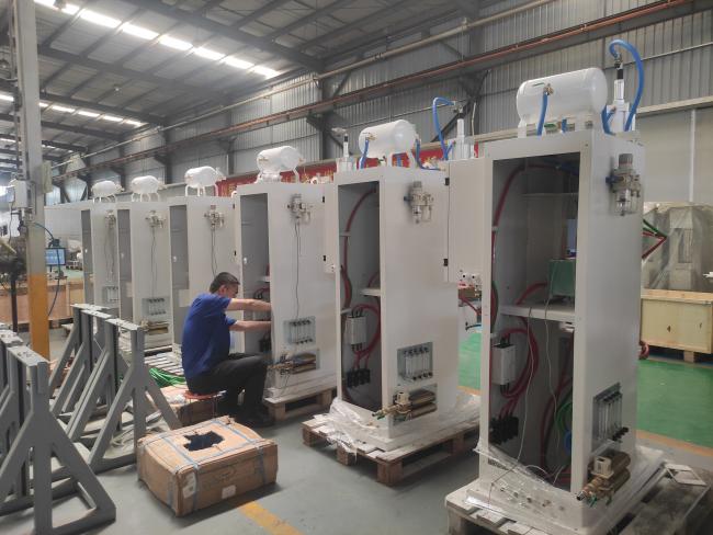 Industrial spot welder in production scene