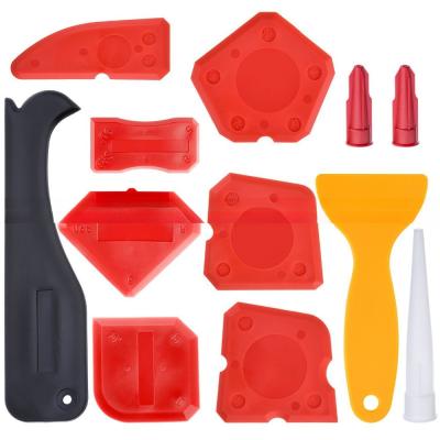 Cina 12 pezzi Kit di attrezzi per il sigillamento Strumento di finitura del sigillante in silicone Grutta raschiatore di gres Rimuovere ugello di gres Cappotti in vendita