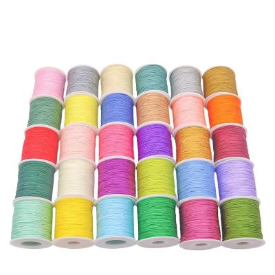 Cina OEM/ODM accettato n.72 50g 0,8 mm filo di nylon di giada per gioielleria fai da te Braccialetto tessuto in vendita