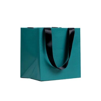 China Creatrust Packaging Heat Seal Zip Gift Handle Strong High-End and Plastic Bags. Kraft Aluminium Foil 1Kg Retail Blue Paper Bag for sale