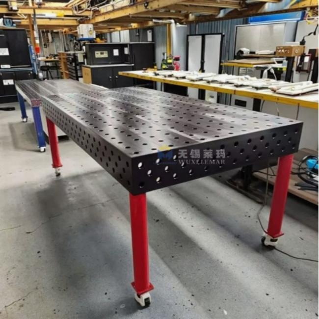 Welding table in use with fixtures