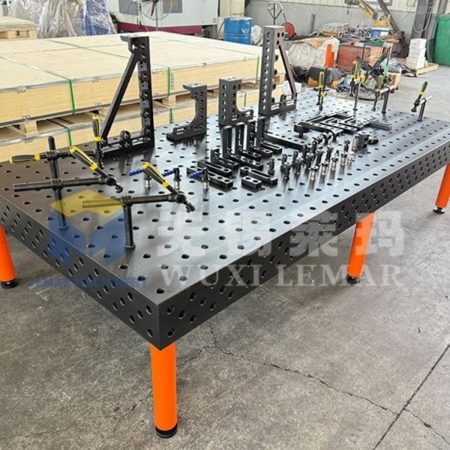 Close-up view of D28 modular hole system and clamping accessories