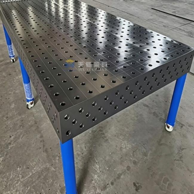 D28 welding table in industrial manufacturing environment