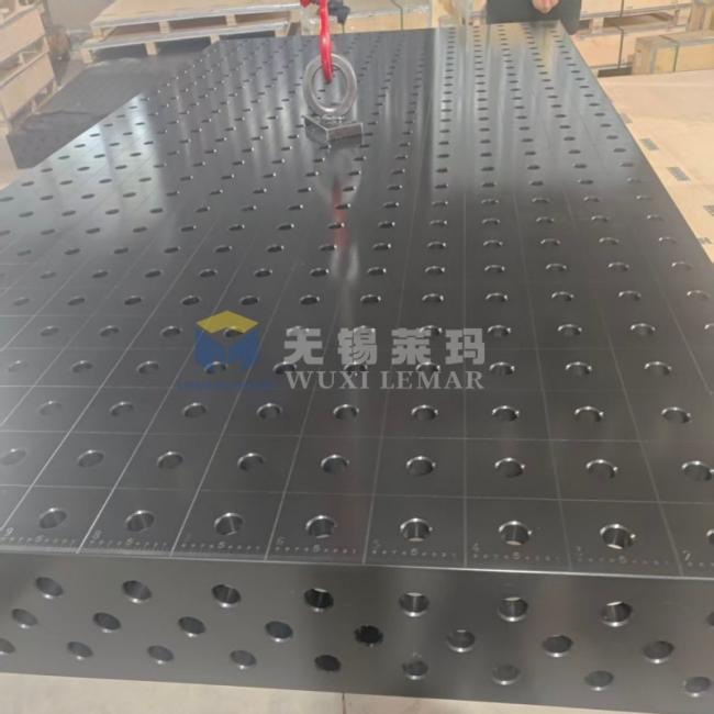D28 welding table in use with structural components
