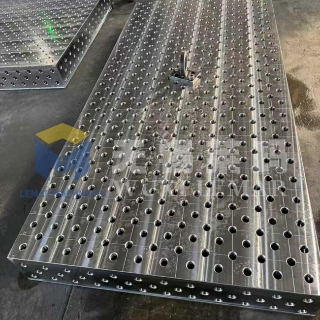 Welding table in use with various fixtures and clamps