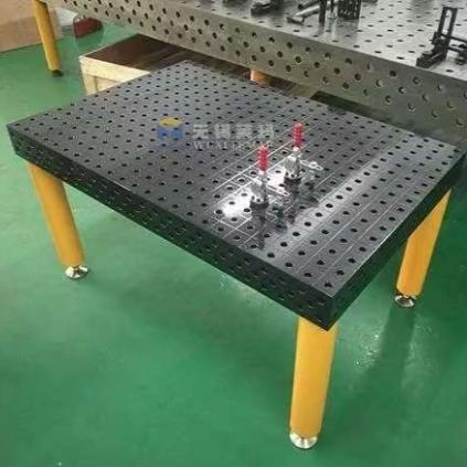 Welding table with marine fabrication components