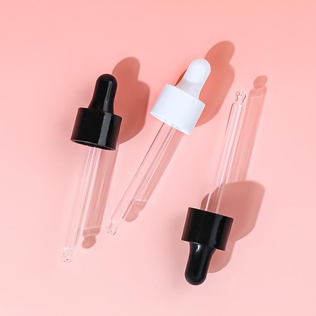 Soft squeeze dropper system for precise cosmetic dispensing