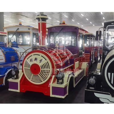Cina Customized Sightseeing Train Manufacturer With Electric Gold Diesel Engine Tourist Steam For Scenic Area Amusement Park 28 Seats in vendita