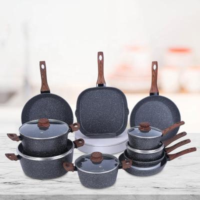 Cina La varia pietra Ollas di alluminio di Maifan delle pentole della cucina dei modelli che cucina il vaso mette con la maniglia di legno spessa in vendita