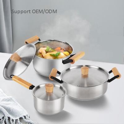 Cina Pezzi diretti della fabbrica i 3 che cucinano gli articoli della cucina dell'insieme del vaso mettono i vasi e le pentole delle pentole fissano la cottura con la maniglia di legno in vendita