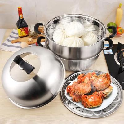 Cina Cucina del venditore più importante di Amazon che cucina il vaso a più strati del vapore di acciaio inossidabile di induzione con la maniglia della bachelite in vendita