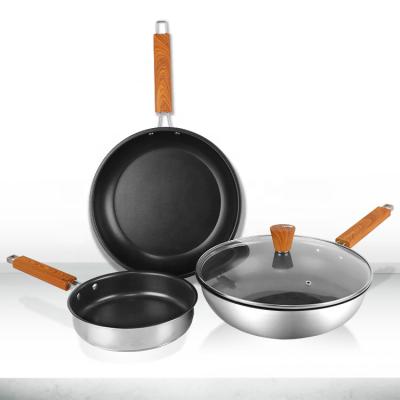 Cina Buona qualità 4 pezzi del vaso e pentole di acciaio inossidabile che cucinano il xilano non messo del bastone più l'insieme delle pentole in vendita