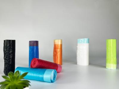 中国 手持ちの引っ張るロープ カスタム プラスチックバッグ ロールパッケージ 家庭用 引線ゴミ袋 販売のため