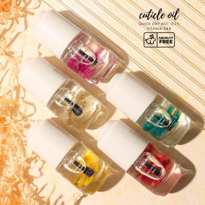 China Nail Beauty Suppliers Scented Cuticle Oil with Real Flowers Moisturizing Nails and Cuticles Good Quality Oil Nourishing for sale