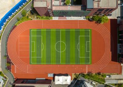 Chine apprêtage en caoutchouc synthétique de sport de sandwich à 400m de voie courante standard de système à vendre