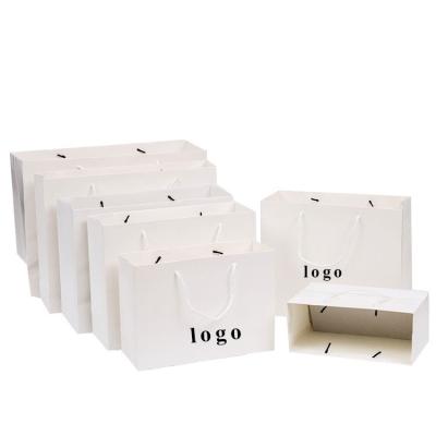 Cina l'abitudine di dimensione gussed sacchi di carta su ordinazione a4 60gsm 45cm dei produttori ha stampato la borsa di stoccaggio della carta kraft per pane con le maniglie della corda in vendita
