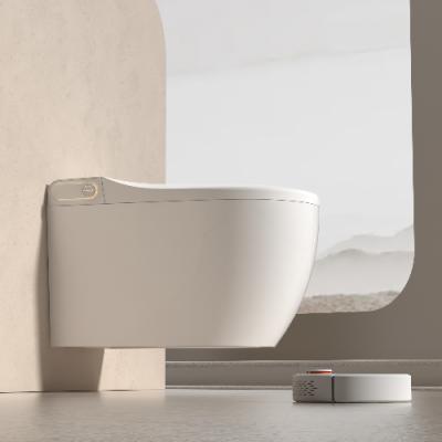 Cina Sensore WC intelligente Spurgito automatico con copertura del sedile riscaldato a temperatura Nero Parete appesa Bagno Bidet Acquario integrato Bagno intelligente in vendita