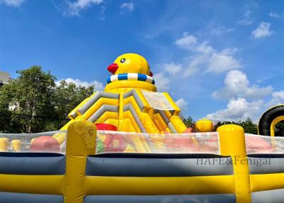 China Castillo de juegos hinchable de pato amarillo inflable grande para exteriores, castillo de rebote en venta