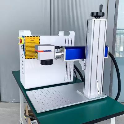 China 30kg Weight Advertising Industry Mini Split Fiber Laser Metal Marking Machine Pulsed Mode of Operation for sale