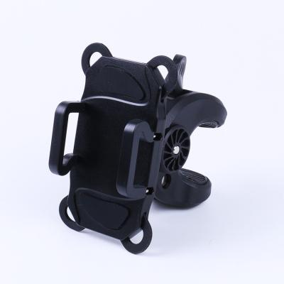 中国 黒いシリコーン バンドが付いている普遍的で頑丈なGPSの運行バイクの電話台紙 販売のため