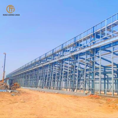 China Metal Building Steel Structure Warehouse - Prefab Steel Frame Construction with Durable Warehouse Design for sale