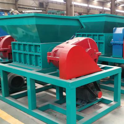 Chine Déchiqueteuse multifonctionnelle à double arbre pour les déchets de bouteilles en plastique et de papier ondulé à vendre