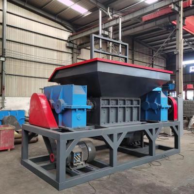 Chine Déchiqueteuse à double arbre pour le recyclage des déchets métalliques des bouteilles en PET en plastique et des palettes en bois à vendre