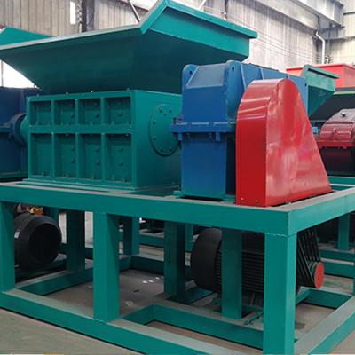 Chine Fabrication de matériaux de construction Deux puits déchiqueteur Machine de recyclage des déchets métalliques et plastiques à vendre