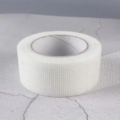 China 0.2 Mm Fiberglass Mesh Tape Roll In 1 Inch Fiber Tape For Drywall for sale