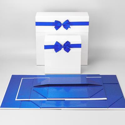 China Blue White Pearlized Ribbon Gift Box Magnetic Closure Design Foldable Storage Premium Pearl Finish for sale