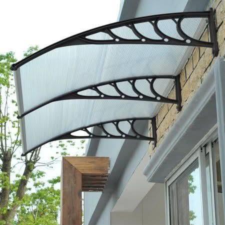 Installed polycarbonate awning on building facade